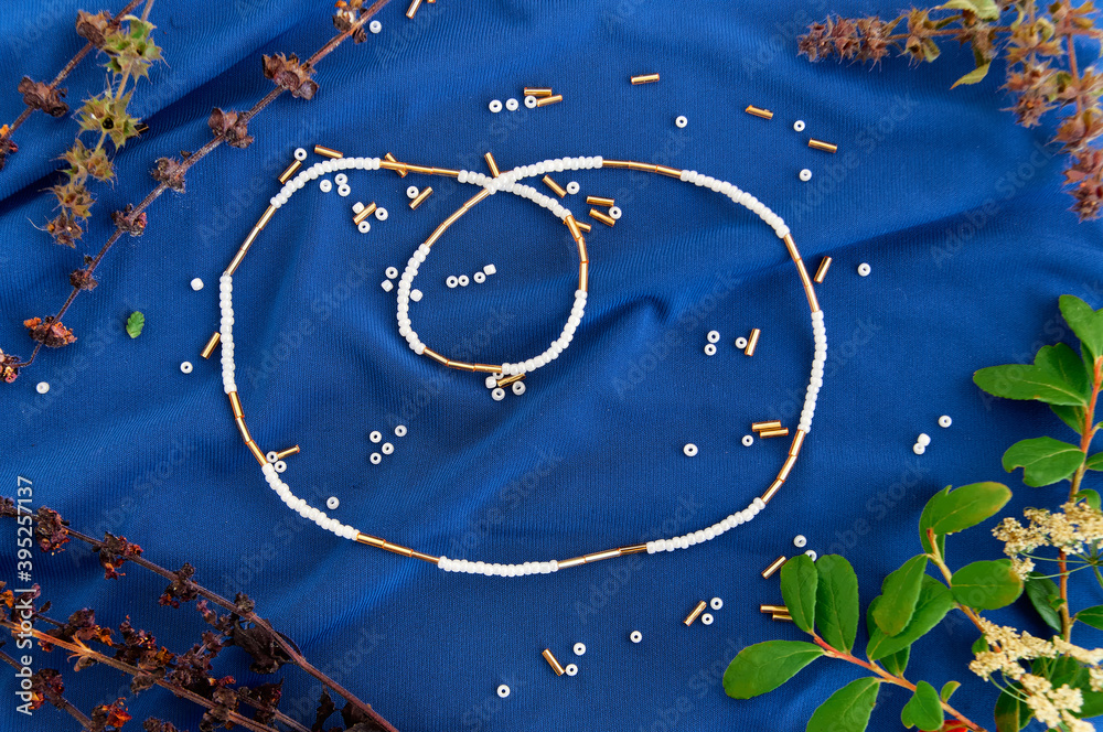 Handmade beadwork, beading as a hobby. background of various flowers ...