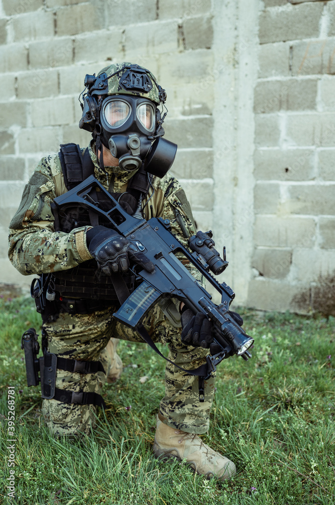 Croatian soldier in Cropat woodland uniform wearing gas mask M95 and ...