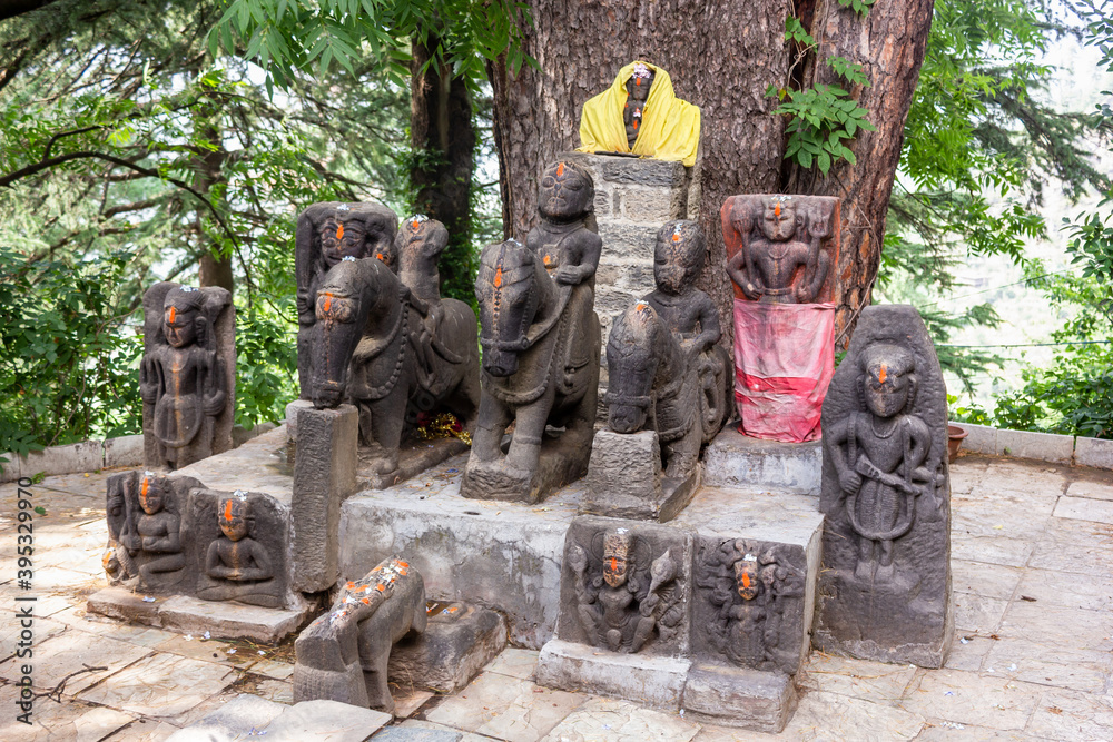 Ancient stone idols of Hindu gods at a shrine Stock Photo | Adobe Stock