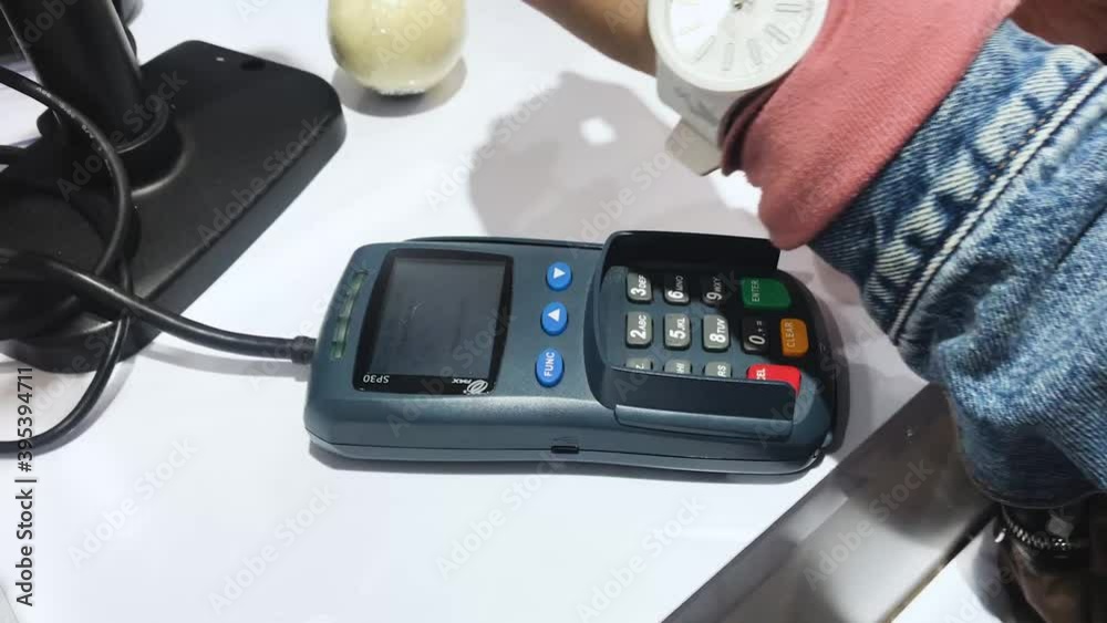 Moscow, Russia, October 2020: a Woman's hand pays for a purchase using ...