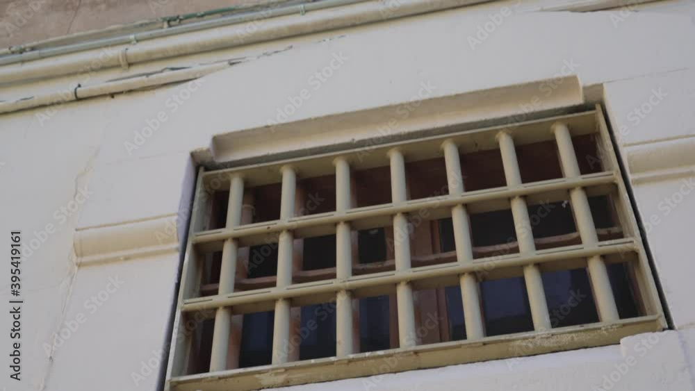 prison cell window with metal bars, close up. outside view Stock ビデオ ...