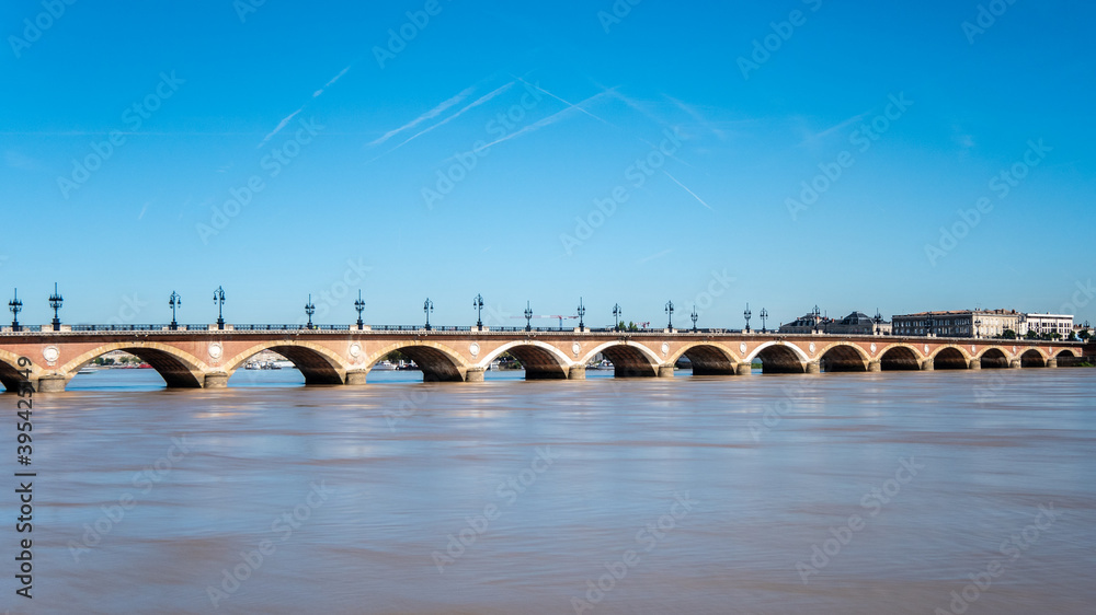 View on the Pont de Pierre (stone bridge) in Bordeaux, France. It is ...