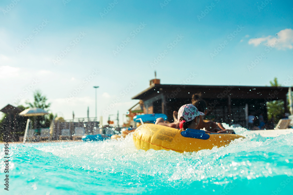 Water park adventure aqua park with cool people having fun on the water ...