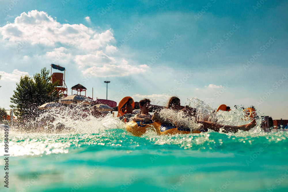 Water park adventure aqua park with cool people having fun on the water ...