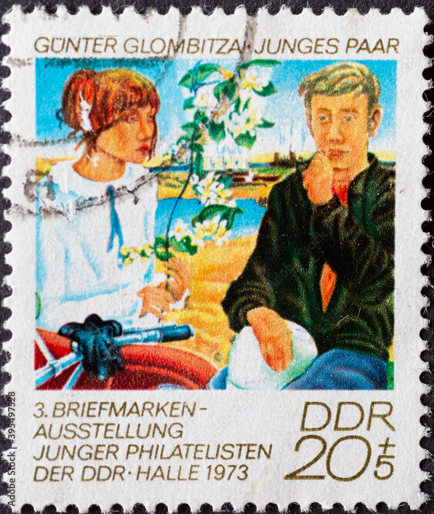 GERMANY, DDR - CIRCA 1973 : a postage stamp from Germany, GDR showing a young couple"; Painting ...
