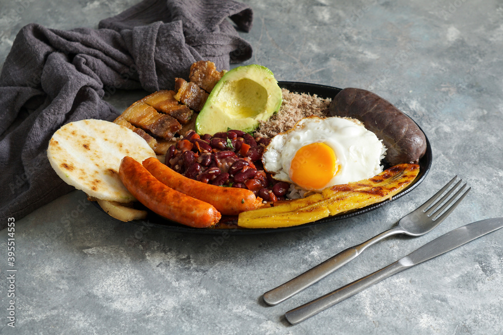 Bandeja paisa - Columbian fried pork belly, black pudding, sausage ...