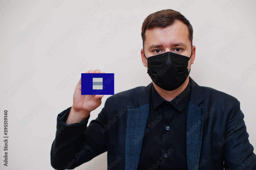 Italian man wear black formal and protect face mask, hold Basilicata ...