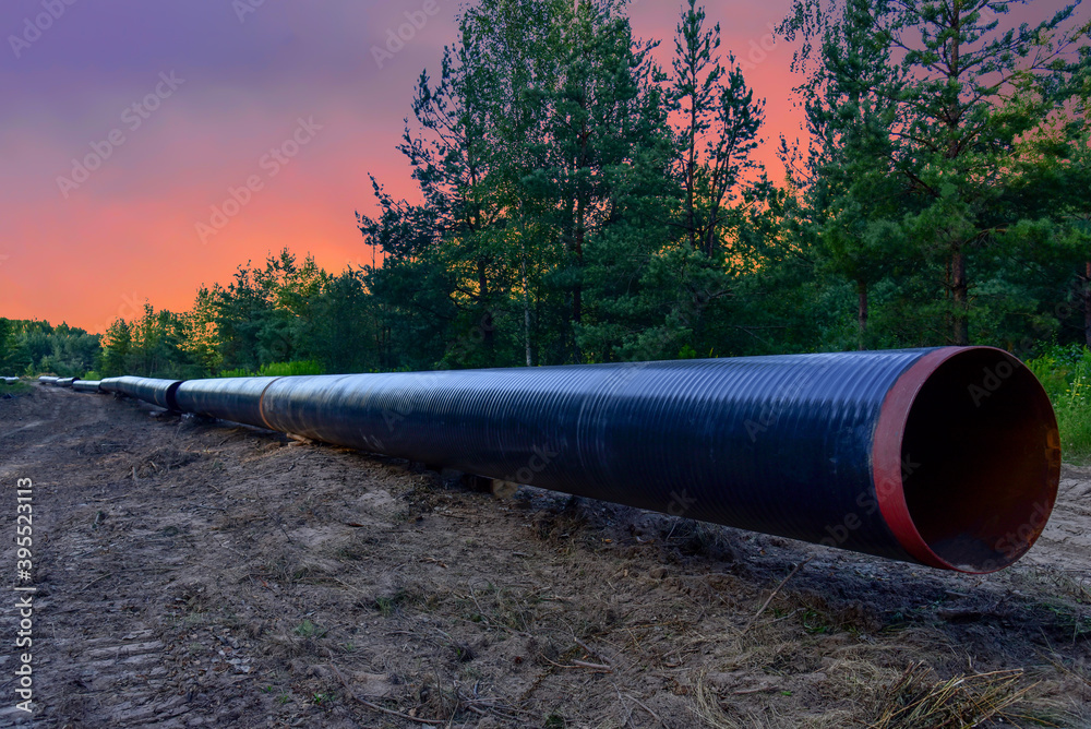 Construction Gas Pipeline Project on amazing sunset background. Natural ...
