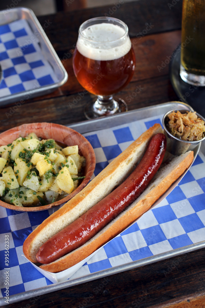 Foot long hot dog at a German-style beer garden Stock Photo | Adobe Stock