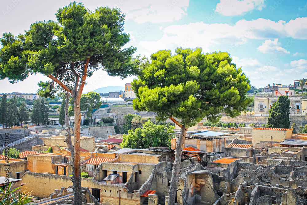 Ruins of the ancient Roman city of Herculanum on the shores of the Gulf ...