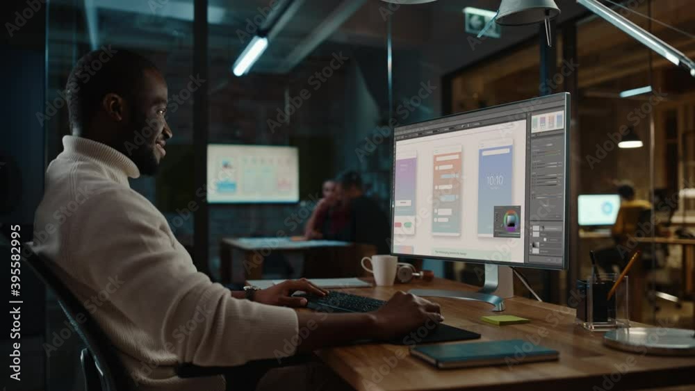 Handsome Black African American Working on Desktop Computer in Creative ...