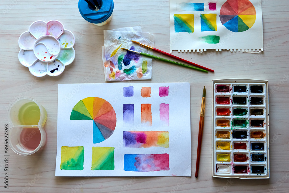 Artist's workplace. Art supplies brushes, paints, watercolors. Art ...