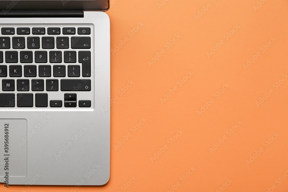 Modern laptop on color background, closeup Stock Photo | Adobe Stock