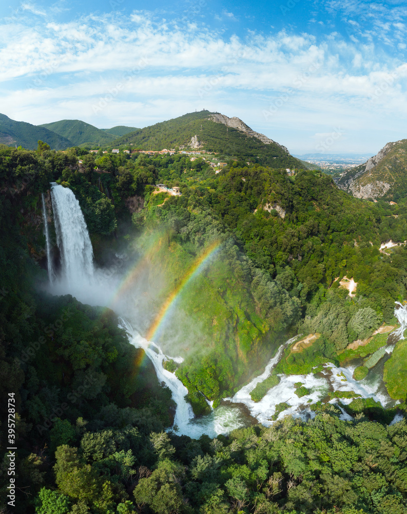 Aerial view. Water discharge, strong, maximum flow. Rainbow. The ...