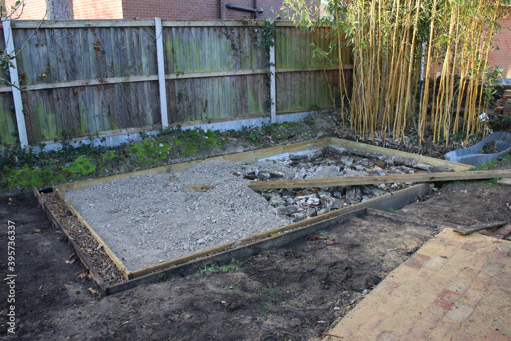 Close up of shed base construction of wood edging prepared hardcore ...