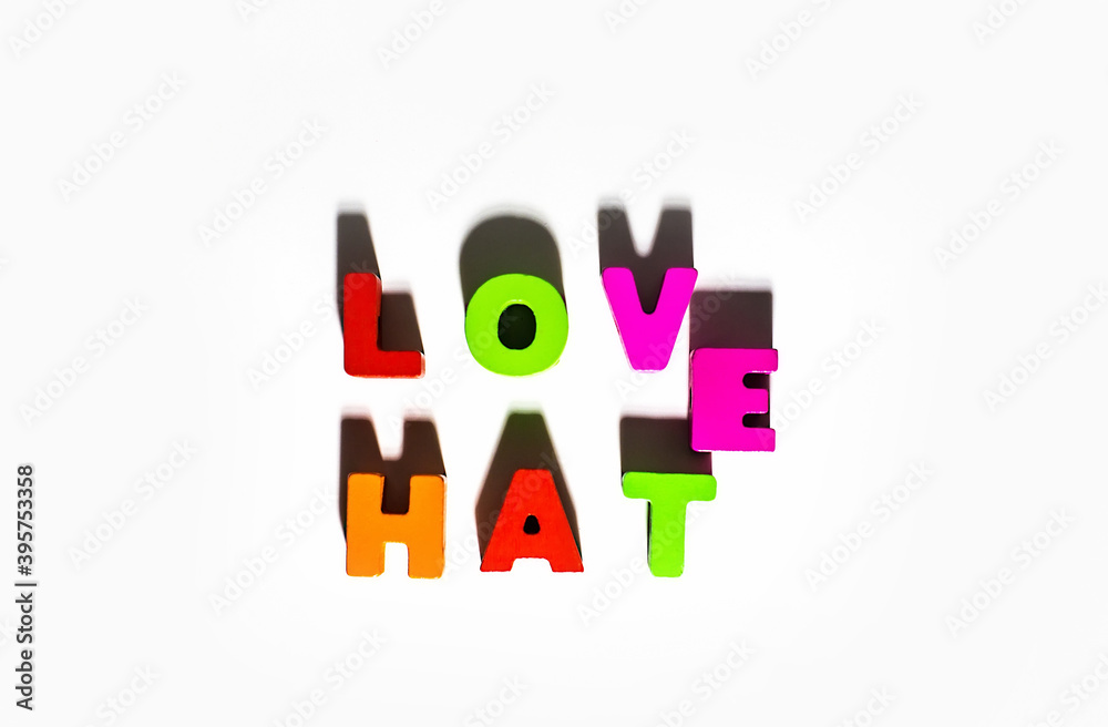 Love Hate words spelling by wooden colorful letters with common E and ...
