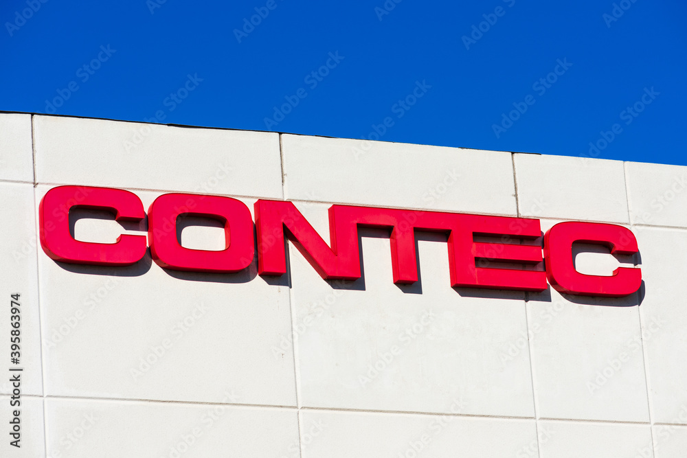 Contec sign, logo at headquarters. Contec provides technology and ...