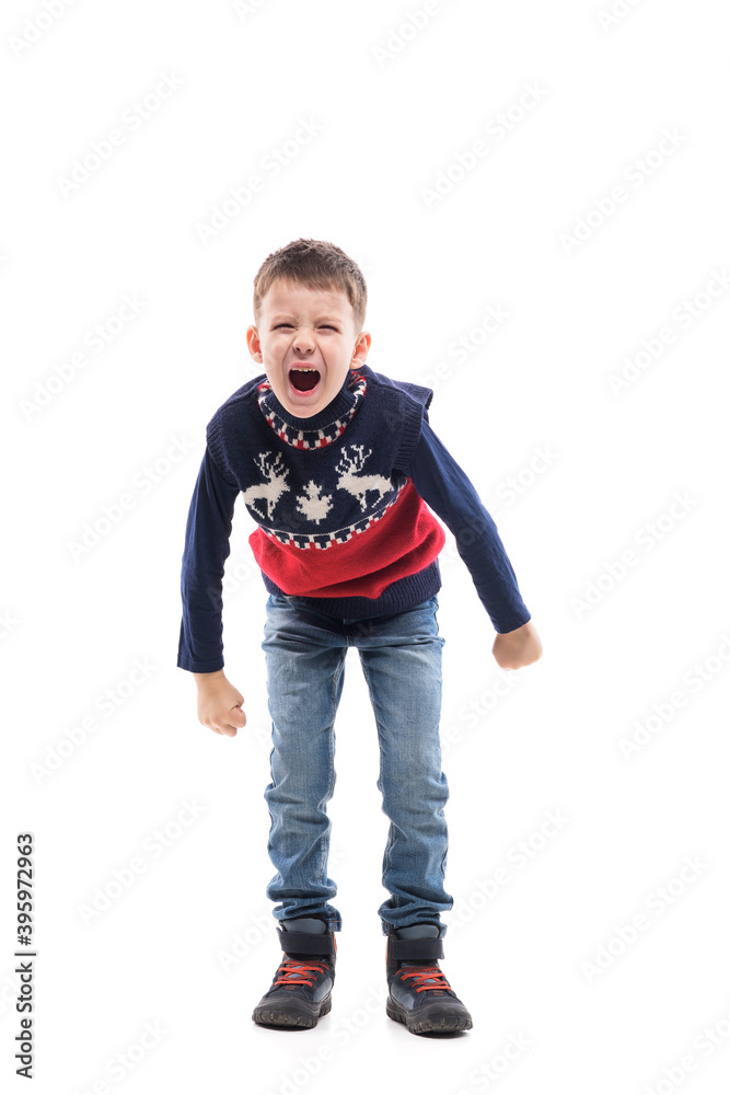 Expressive frustrated little kid screaming and yelling at camera with ...