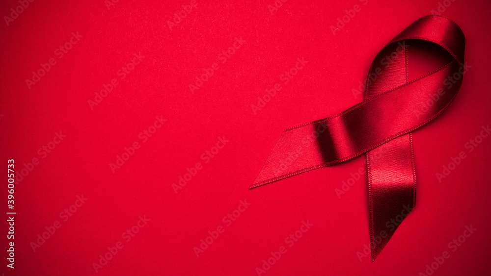 Aid ribbon silk. Red ribbon symbol in hiv world day on dark red ...