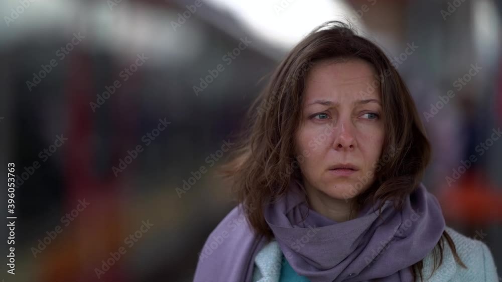 sad crying woman on train platform, leaving city and suffering vídeo de ...