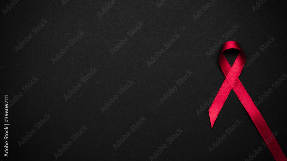 Cancer ribbons. Red ribbon symbol in hiv world day on black background ...