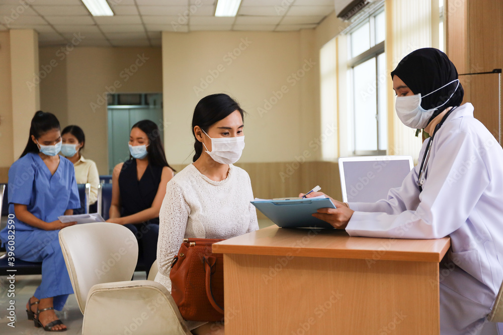 Patient wear face mask was sick and meet or talking with doctor or ...