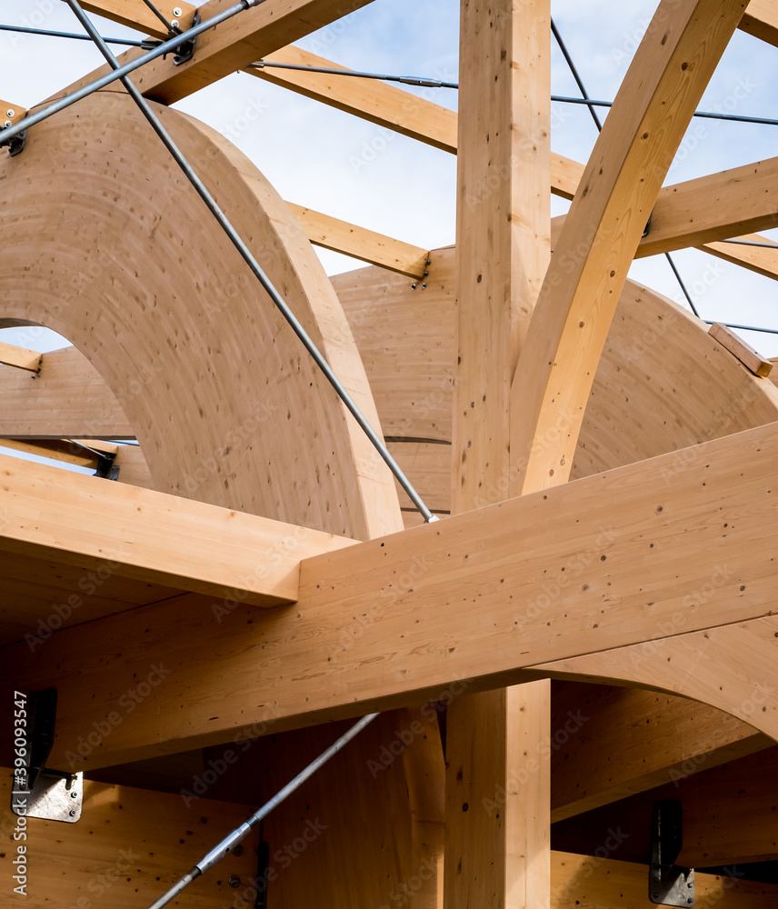 Detail of a modern wooden architecture in glued laminated timber on a ...