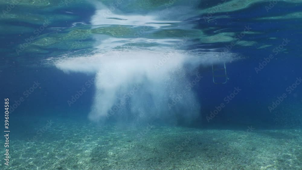 boat underwater scuba diver jumps into water to start diving ocean ...