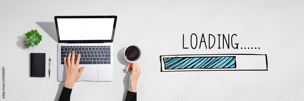 Foto de Loading concept with person using a laptop computer do Stock ...