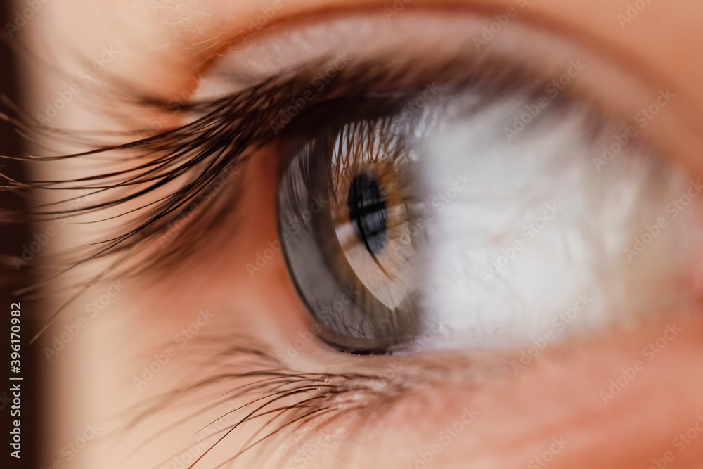 Macro photography of a girl's eye that looks away. Blurred edges. Stock ...
