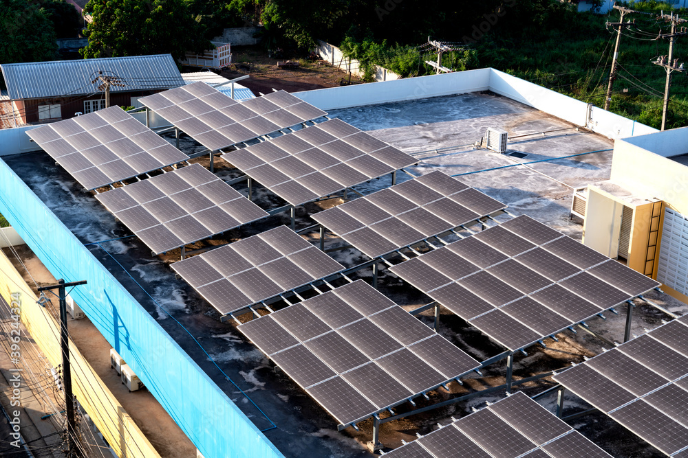 Solar panels or Solar cells on building rooftop or terrace with sun ...