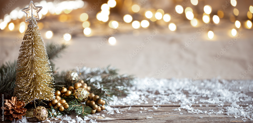 Christmas cozy background with decor details, snow and blurry lights ...