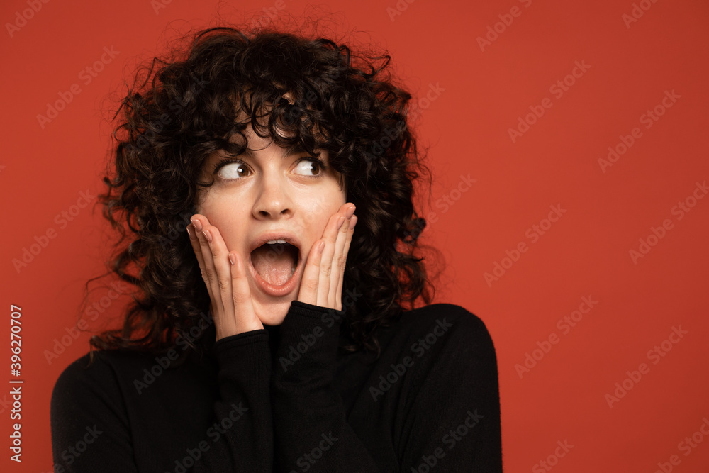 Headshot of good looking surprised scared female with wide opened mouth ...