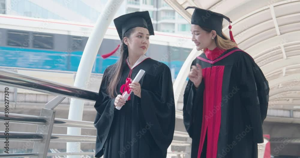 2 Student wearing graduation jacket celebrate success their learning at ...