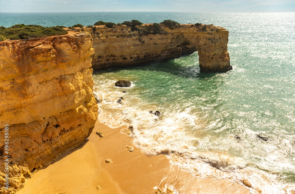 Natural caves and beach, Algarve Portugal. Rock cliff arches of Seven ...