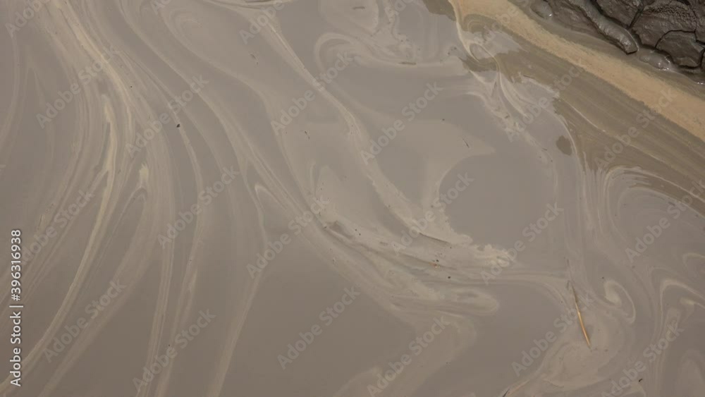 Dense, fluid, heavy and thick muddy water. Mud is soil, loam, silt or ...