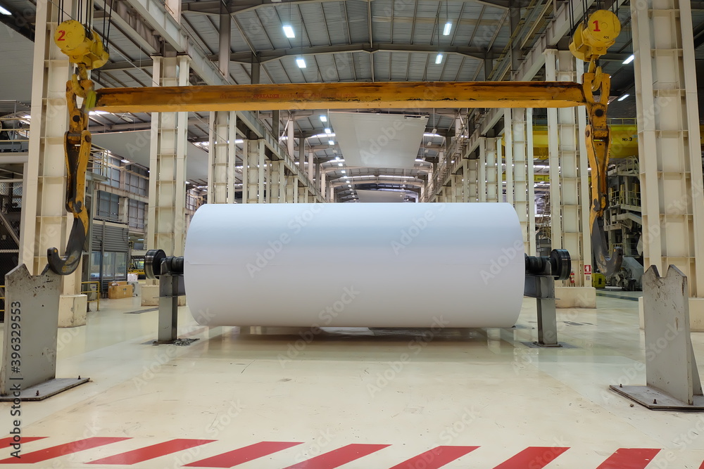Jumbo reel of paper in Paper mill for a resize. Stock Photo | Adobe Stock