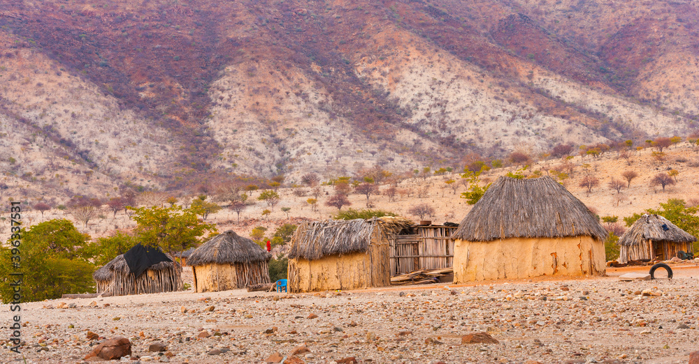Himba village with traditional huts in north Namibia Stock Photo ...