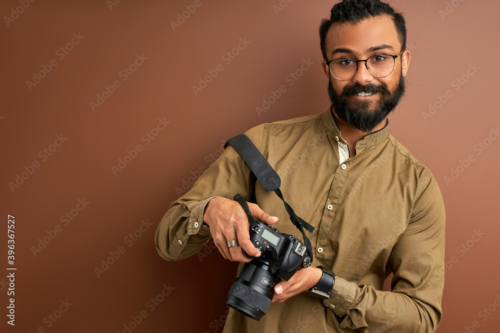 indian arabic photographer male with camera smiling, open-minded happy ...