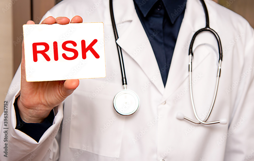 Risk sign in female physician hands, doctor warning about diseases ...