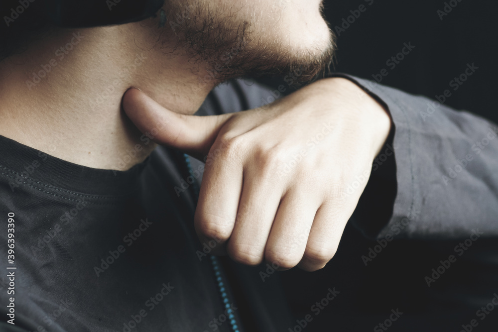 Faceless furious gamer having violent look, making threatening sign ...