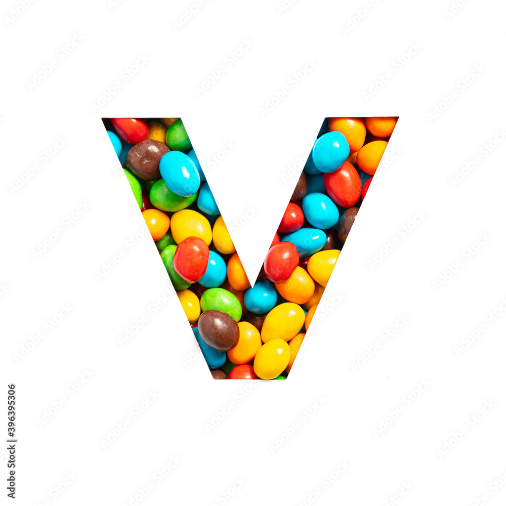 Letter V of English alphabet of multicolored candies and paper cut ...