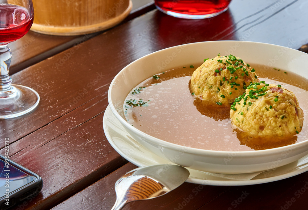 Traditional hot home made food in alpine rifugio in the Dolomite Alps ...