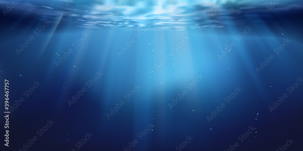 Underwater background, ocean or sea surface seen from under water. Rays ...