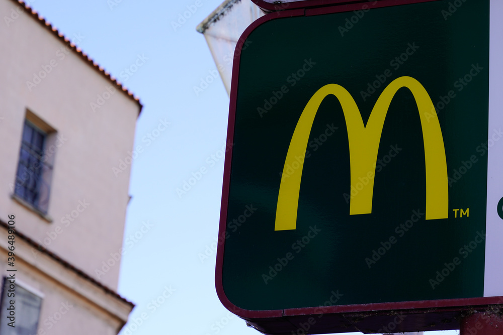 McDonalds logo and text m sign of global chain of fast food restaurant ...