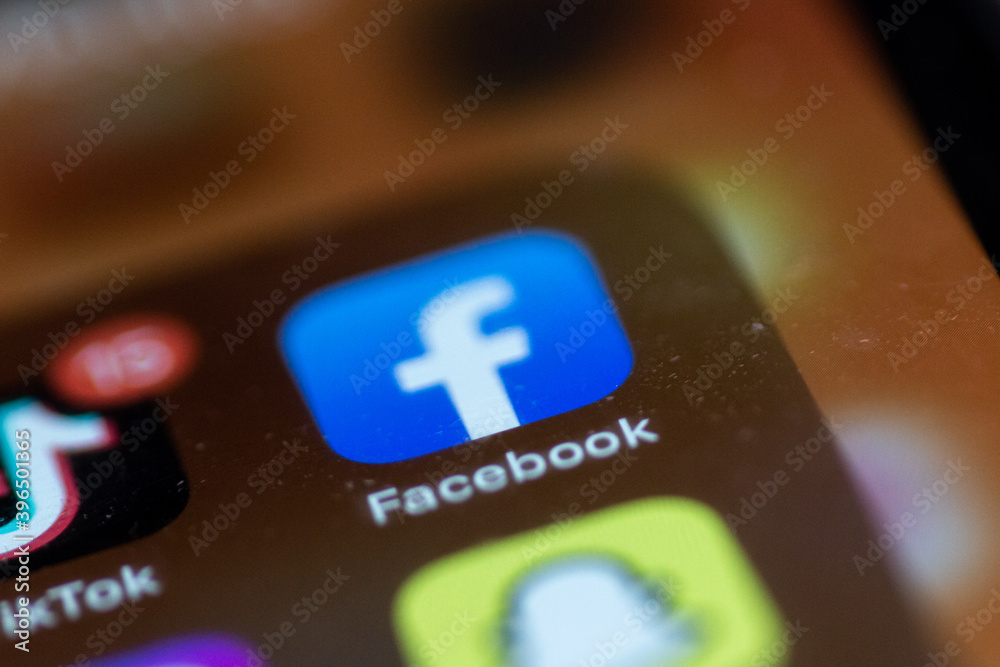 iOS social media apps on the screen of iPhone. Logo and app icons of ...