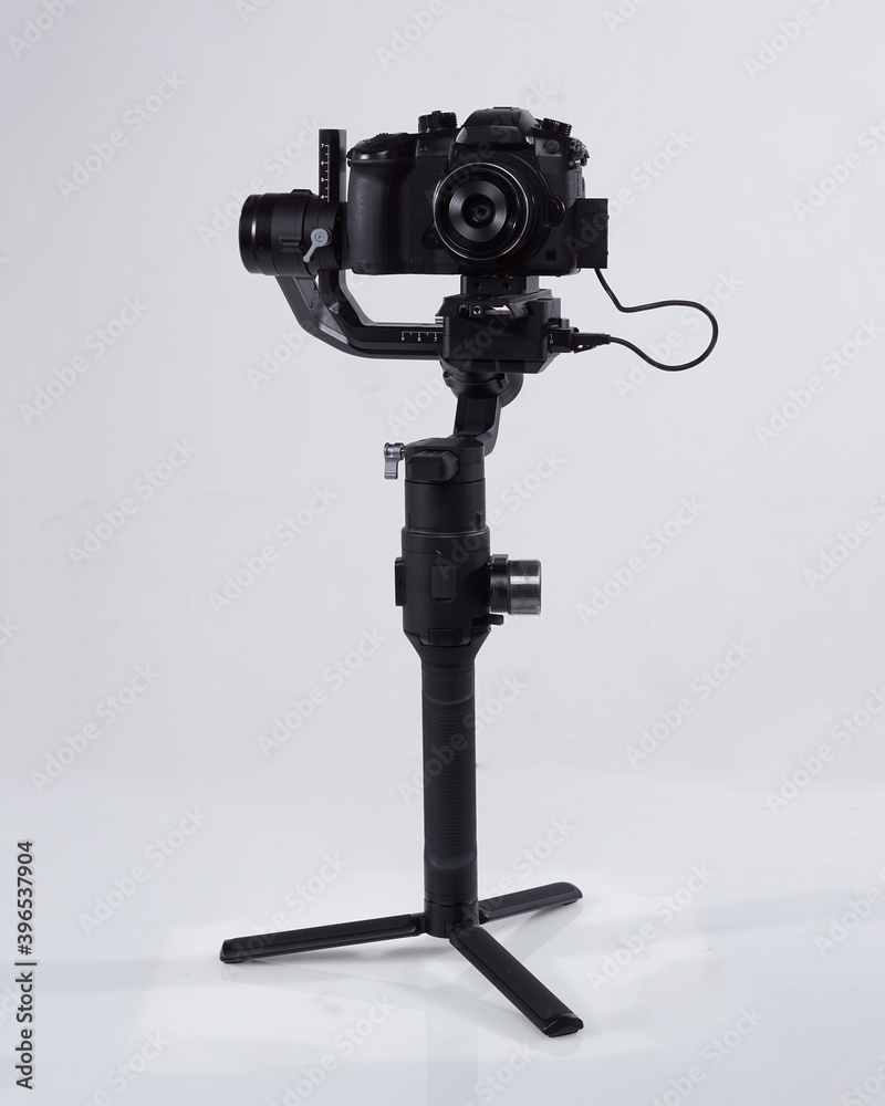 Mirrorles professional cameras with a gimbal camera stabilizer. Video ...