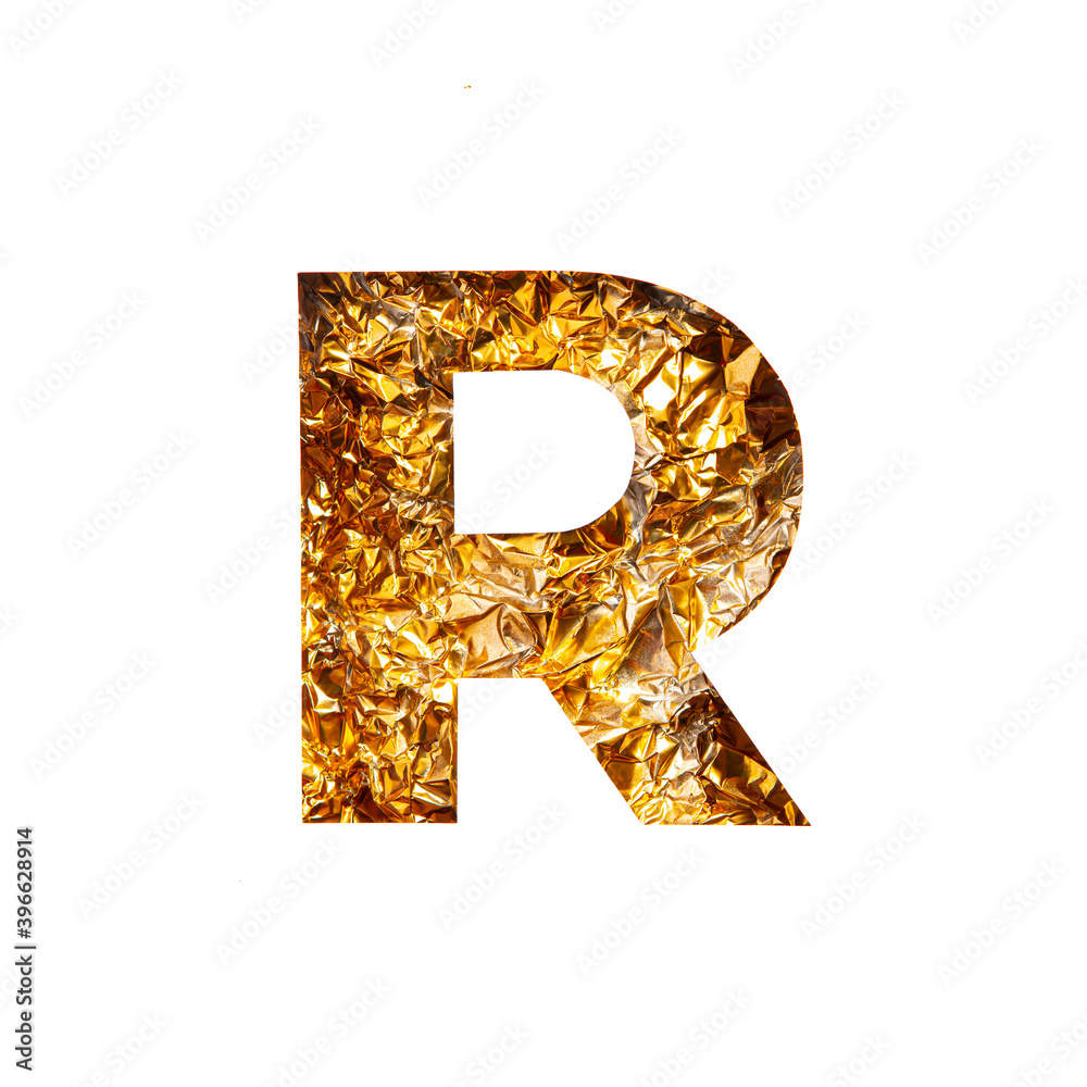 Gold letter R of English alphabet of shiny crumpled foil and paper cut ...