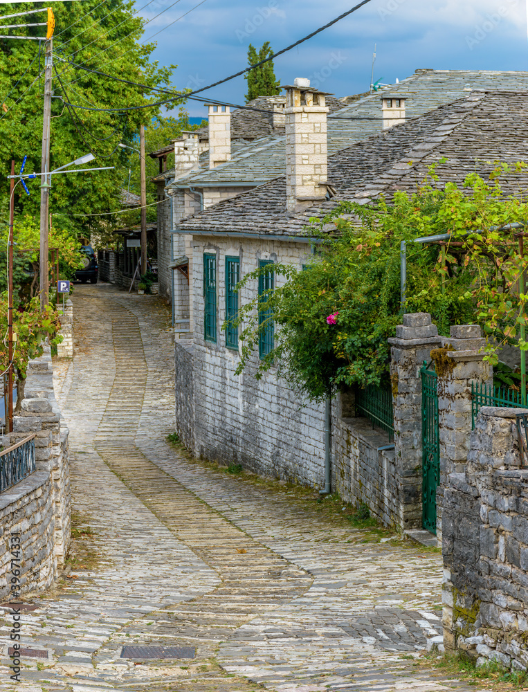 Traditional architecture with narrow street and stone buildings a in ...