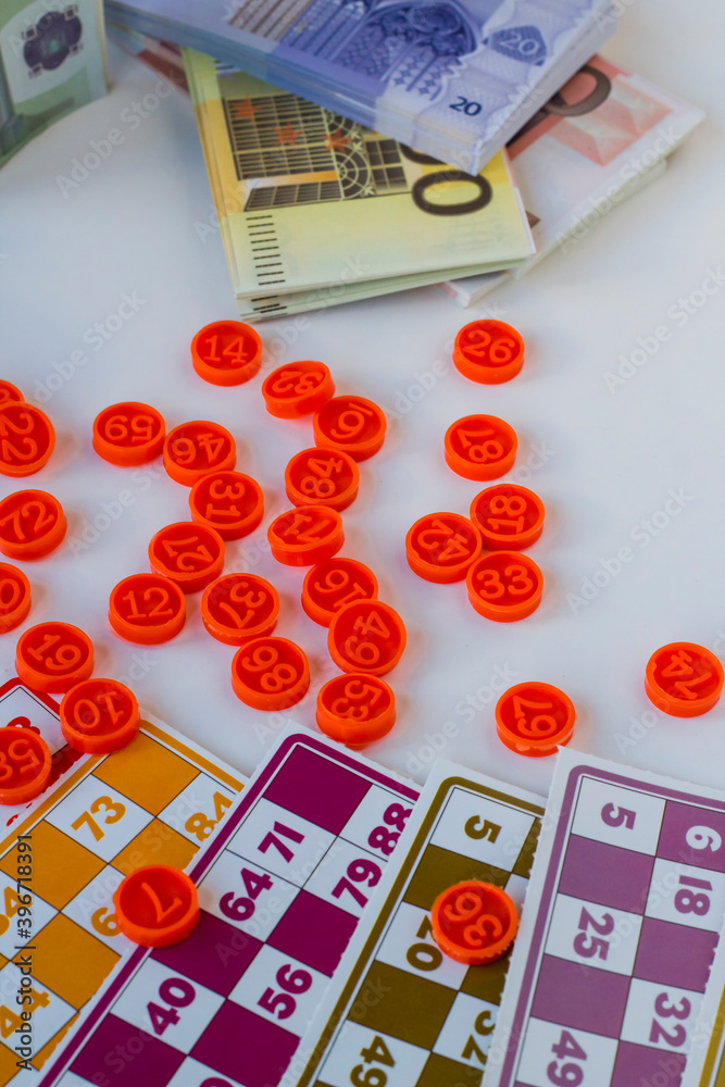 Colorful bingo game cards and numbers on white background with euro ...